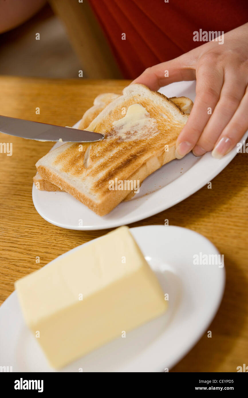 Being buttered hi-res stock photography and images - Alamy