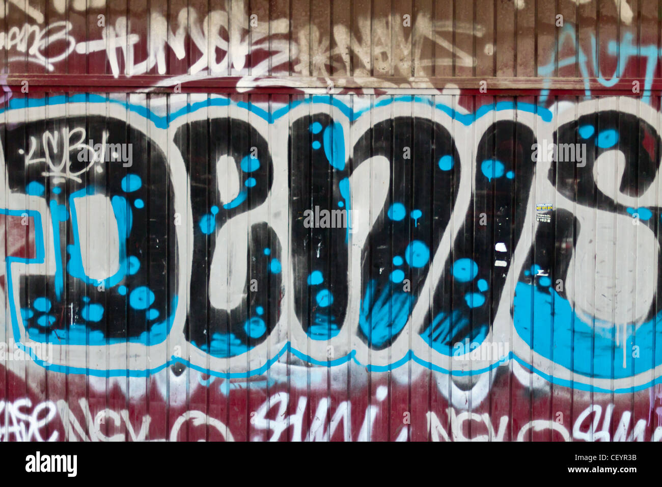 A graffiti on a garage in Madrid by an anonymous artist Stock Photo - Alamy