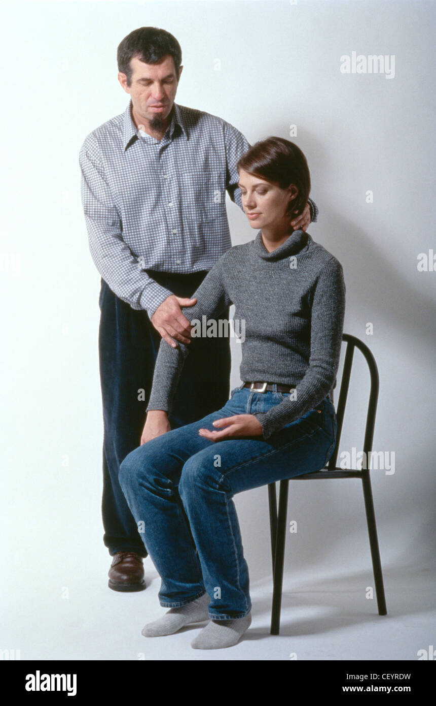 Alexander Technique Male wearing check shirt, black trousers ...