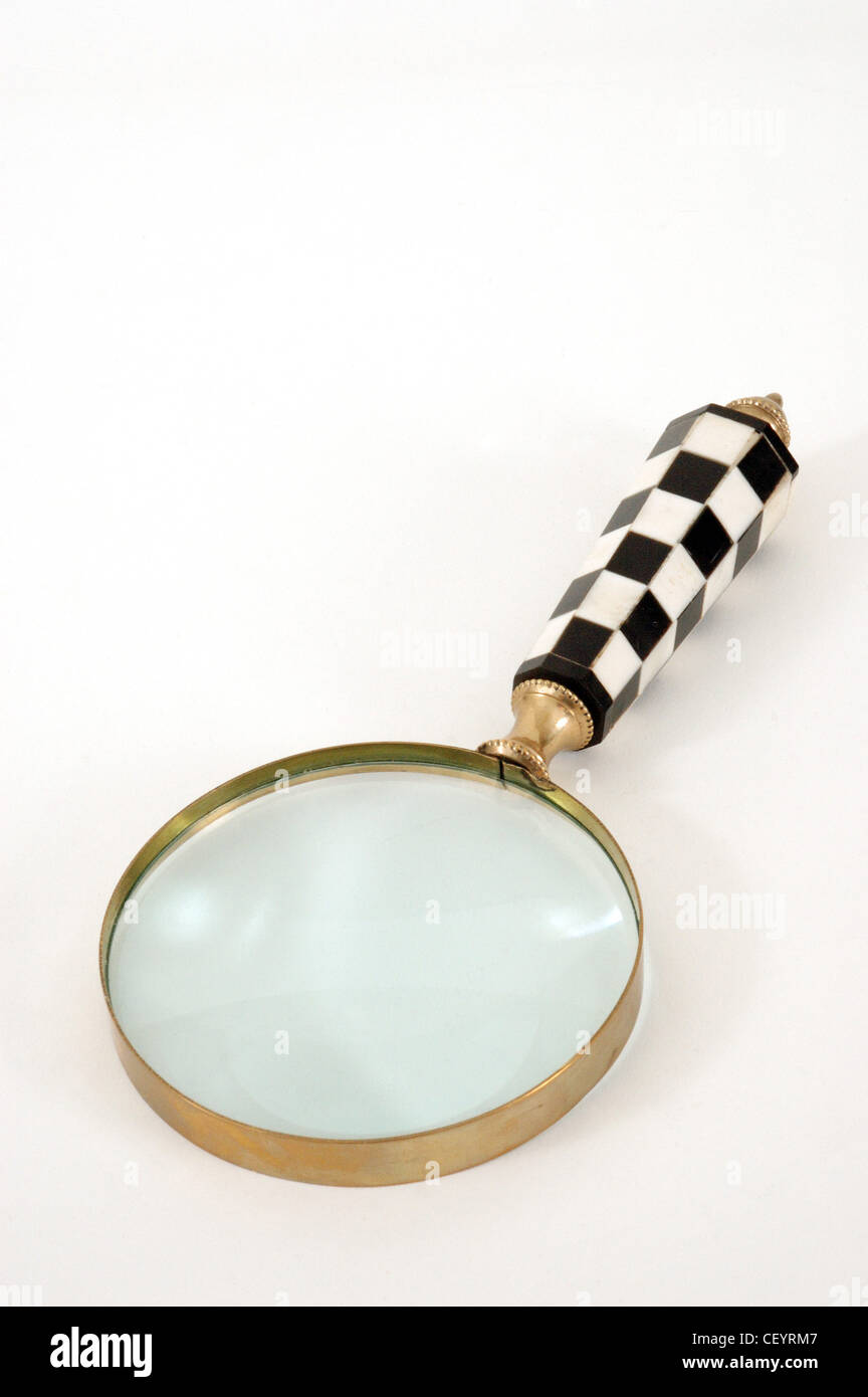 A magnifying glass with a black and white checkered handle Stock Photo ...