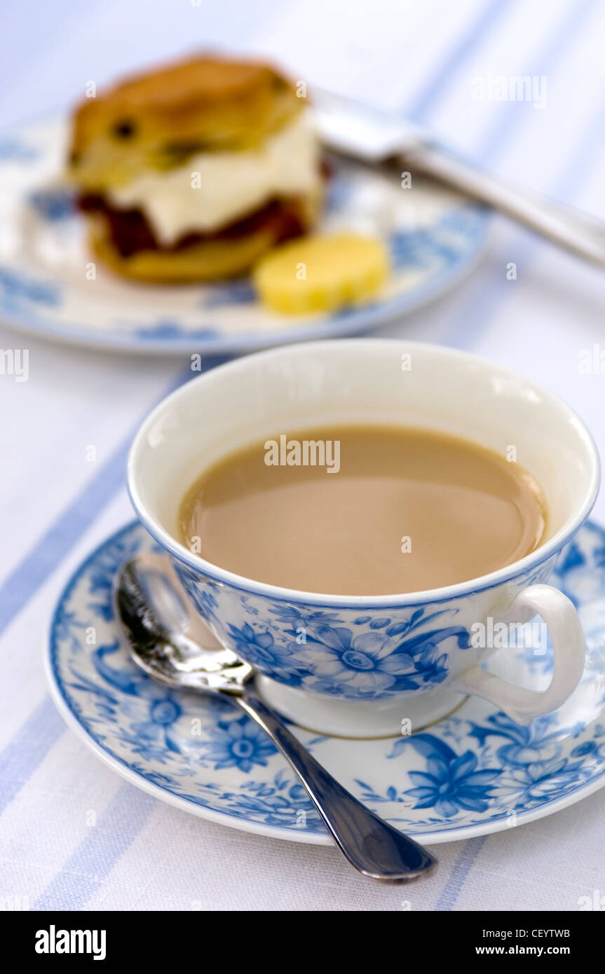 An English cream tea Cup of tea, scone with butter, jam and cream Stock ...