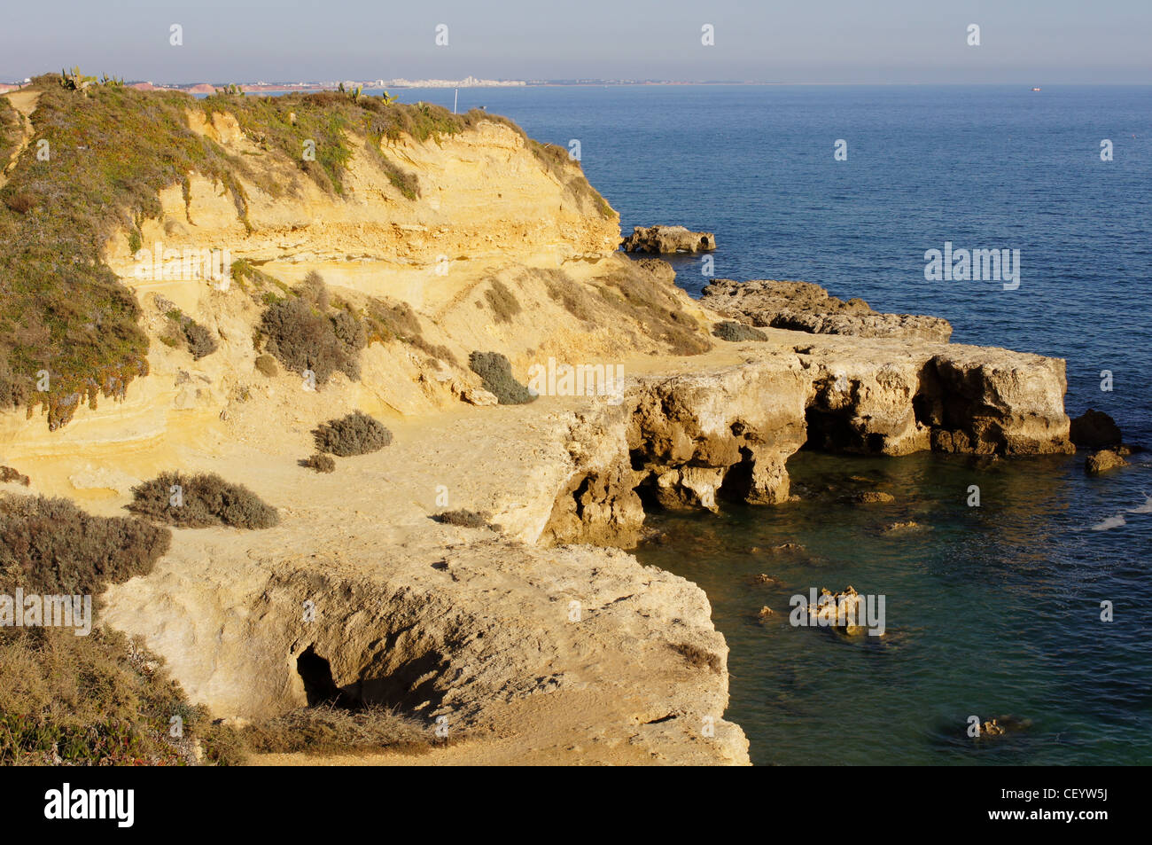 Albufeira rocky coastline Stock Photo - Alamy