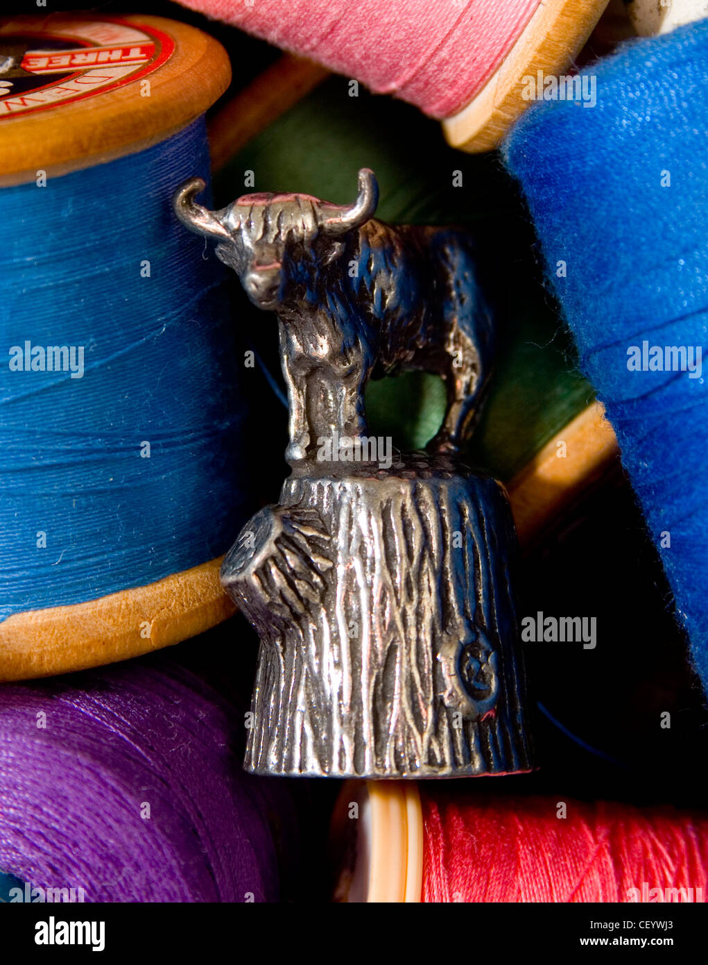 Horoscopes Taurus A silver thimble with the Taurus symbol of a bull and ...