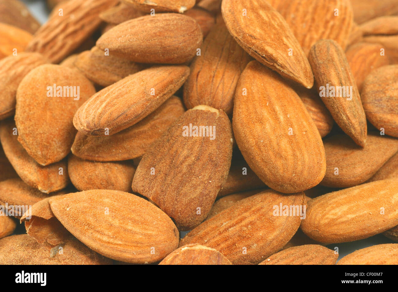 A close up of whole almonds Stock Photo - Alamy