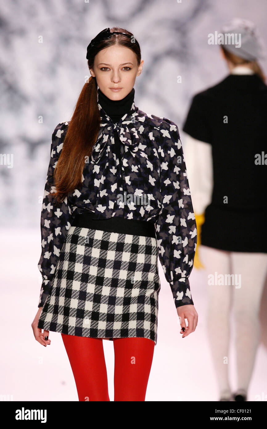 Milly New York Ready to Wear Autumn Winter A black polo necked top worn ...