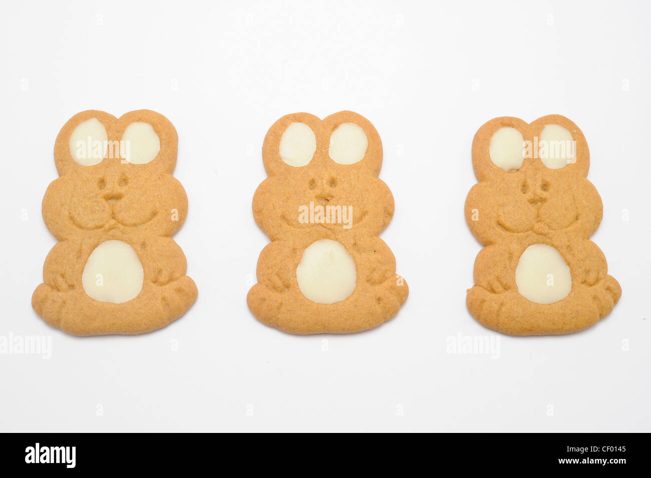 A still life image of three easter bunny biscuits Stock Photo - Alamy