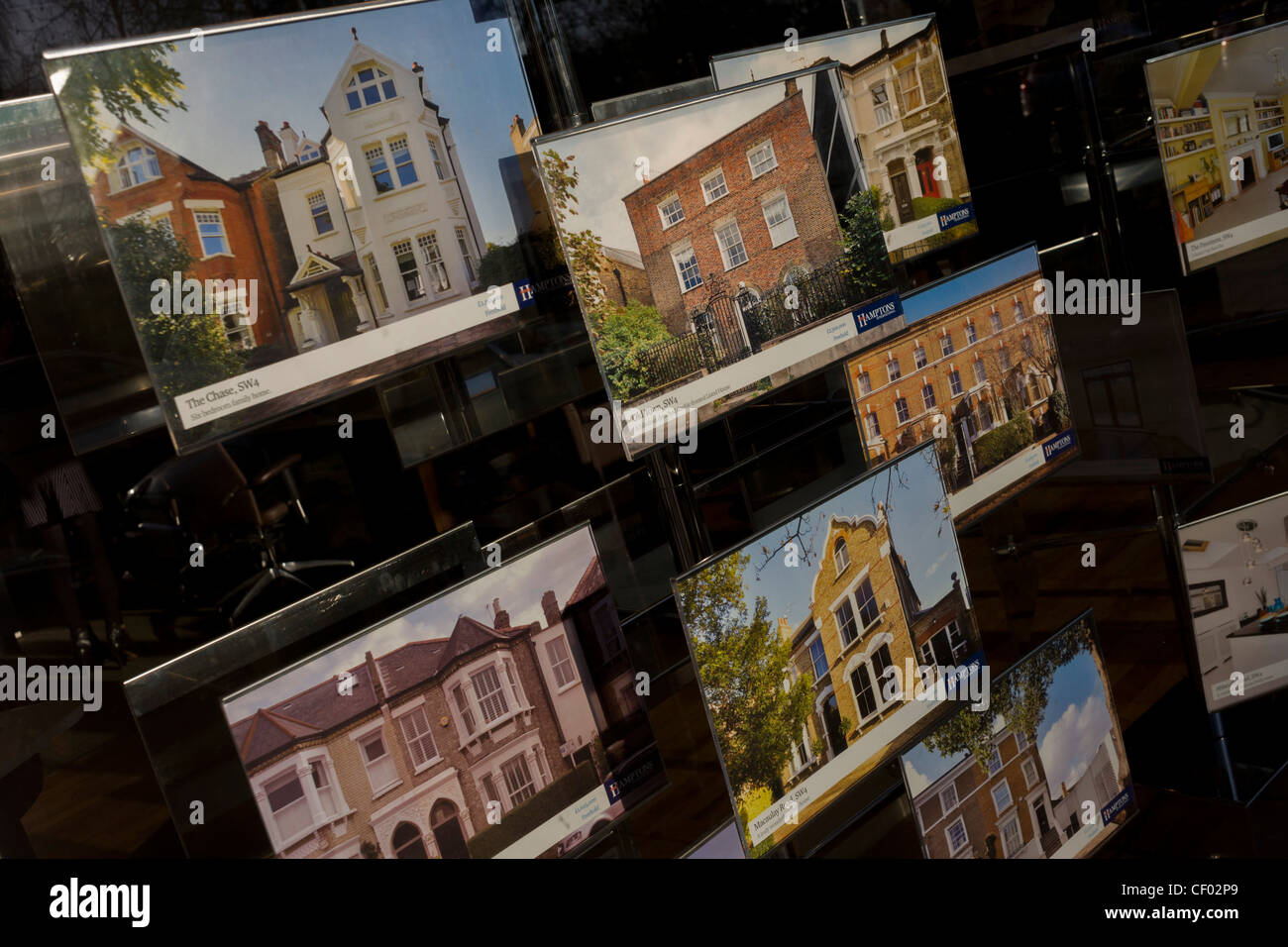 Images of properties on view in the window of Hampton's International ...