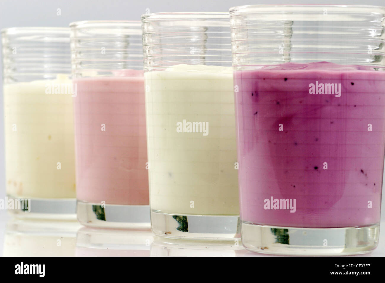 A row of fruit smoothies in different colours Stock Photo - Alamy
