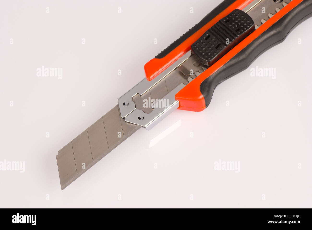 Cutter knife on white background Stock Photo - Alamy