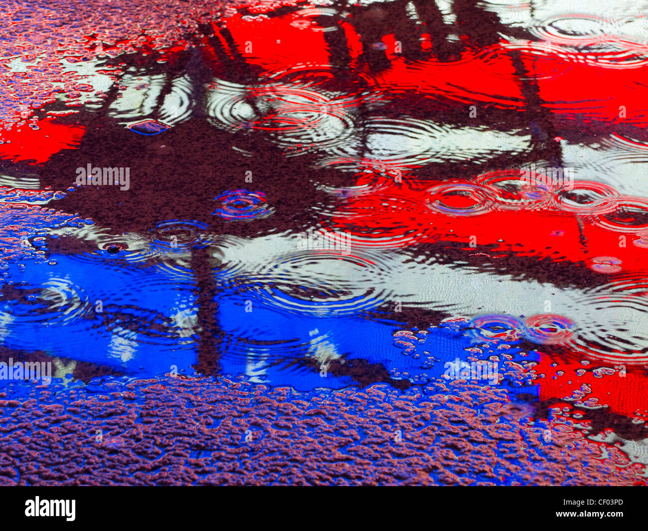 American flag reflection in a puddle Stock Photo - Alamy