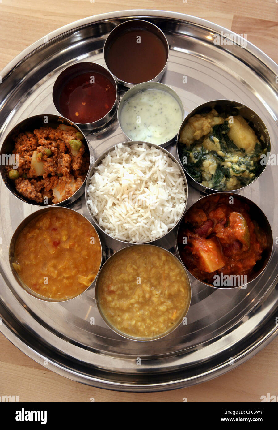 A meat thali, minced lamb and potato curry, dhal, rice , mixed ...