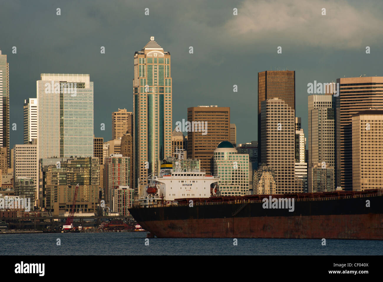 A dramatic sunset highlights the beautiful Seattle waterfront across ...