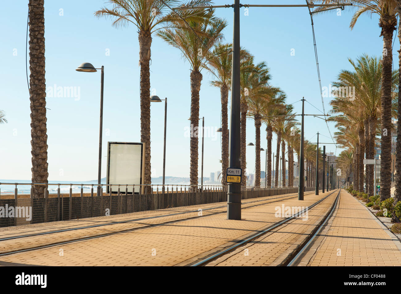 Tram line running along a beach resort Stock Photo - Alamy
