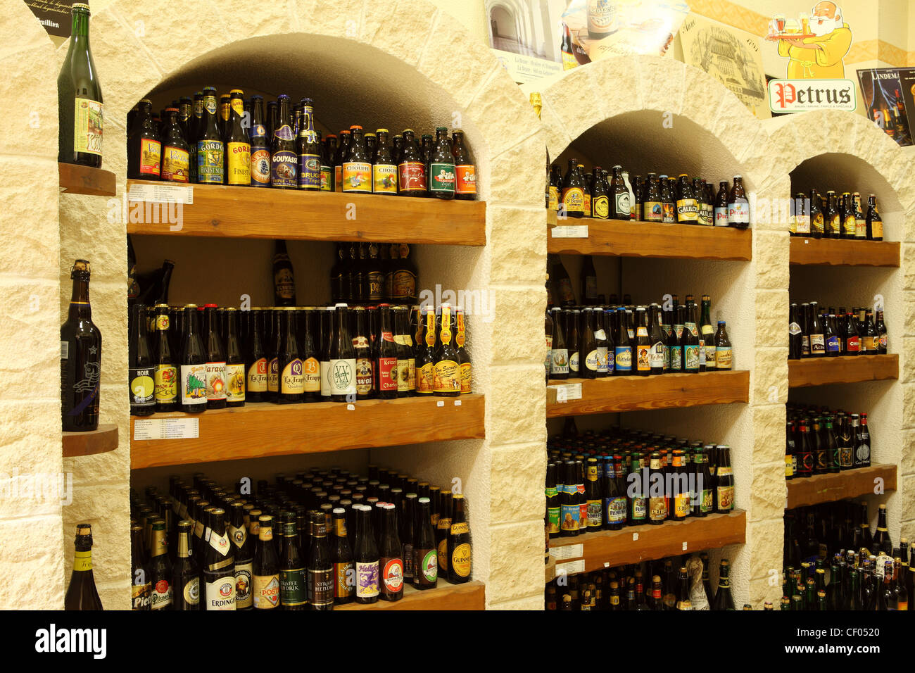 Bottles of boutique beers, many from Belgium, on sale on the shelves of ...