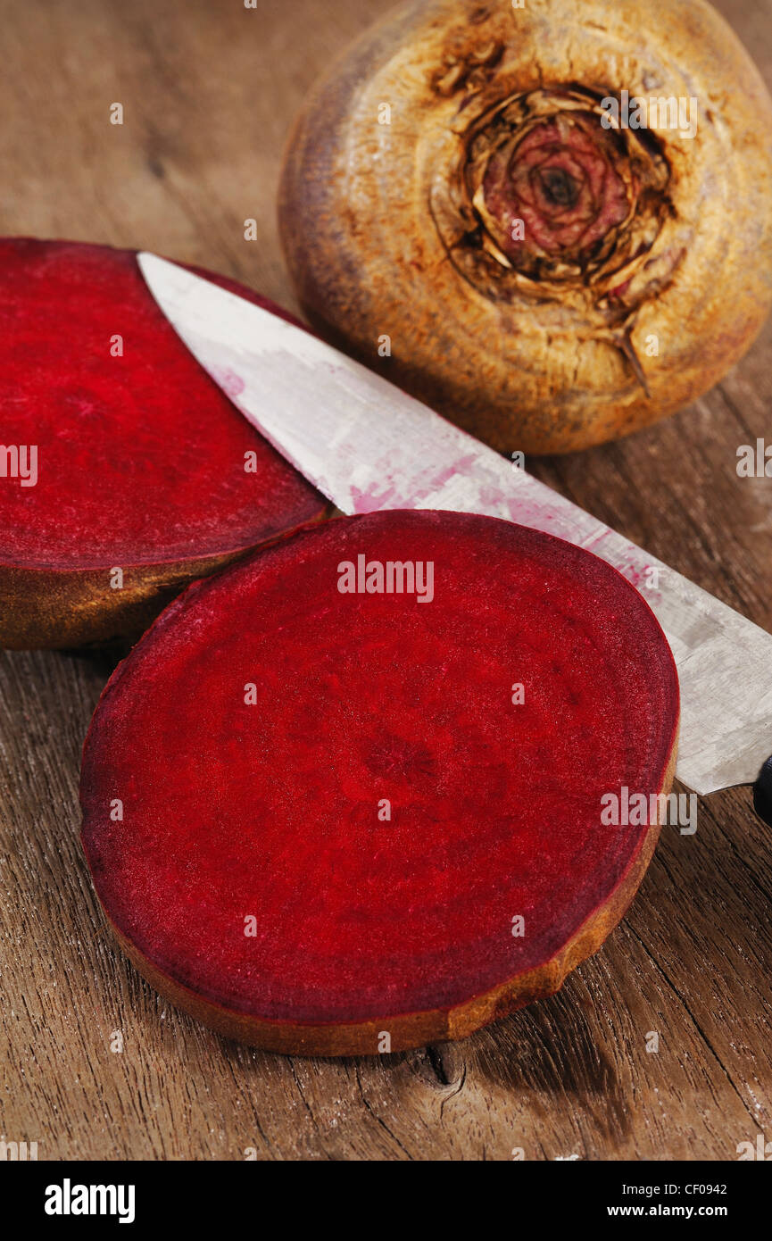beet roots on wooden background Stock Photo - Alamy