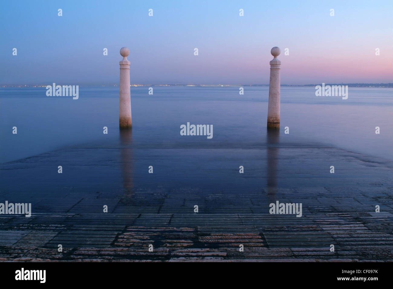 Twin columns on the Tagus River opposite Praca do Comercio, Lisbon ...