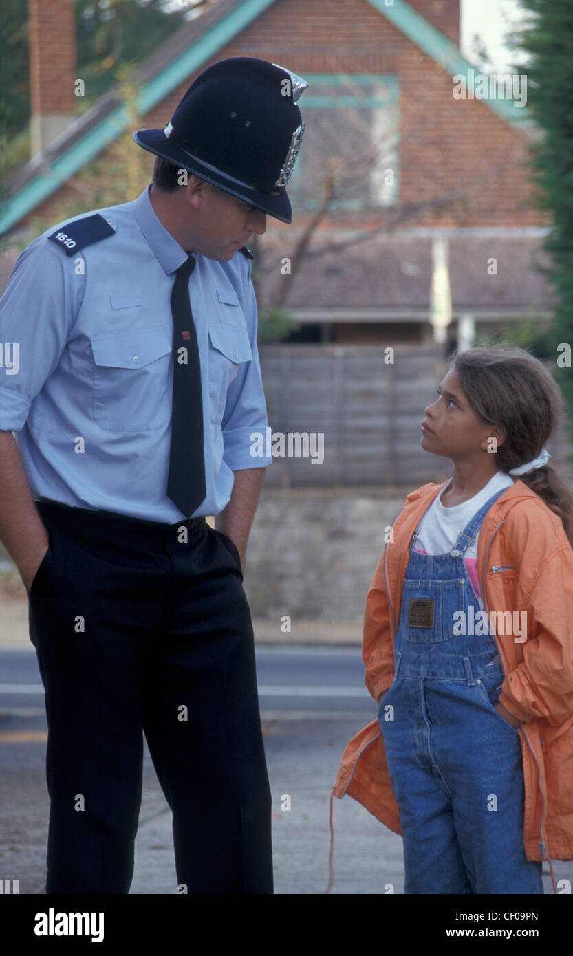 Police officer talking to child hi-res stock photography and images - Alamy