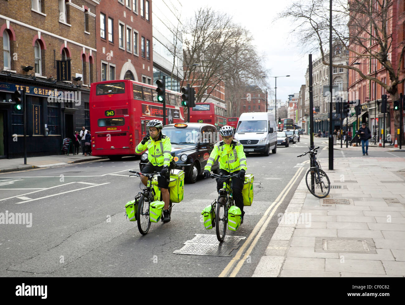 Bicycle paramedic riding on a street in Central London, England, UK ...