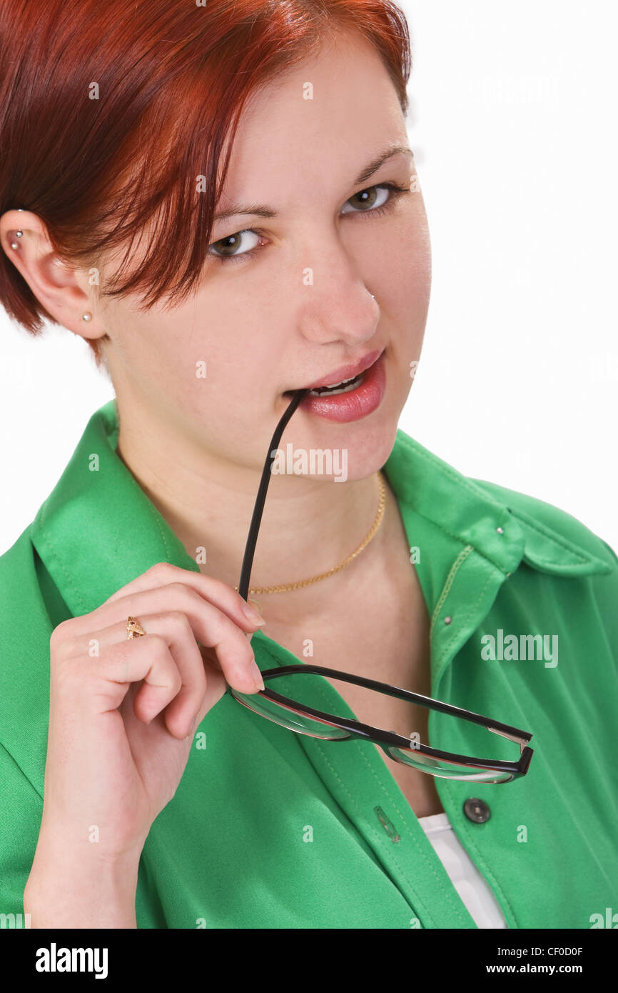 Portrait of a young redheaded girl looking slick with the sidepiece of ...