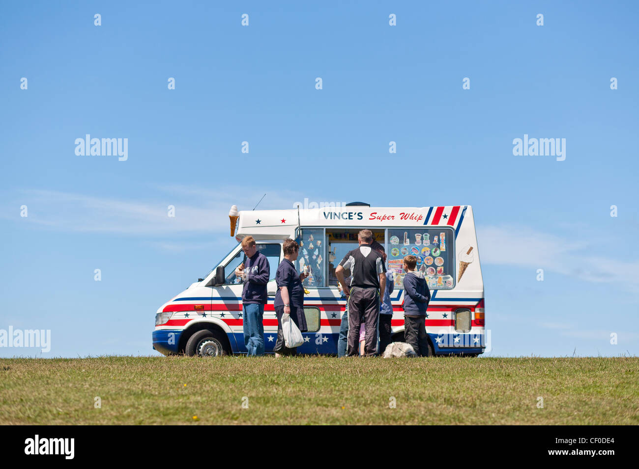 people queue at a traditional english ice cream van Stock Photo - Alamy