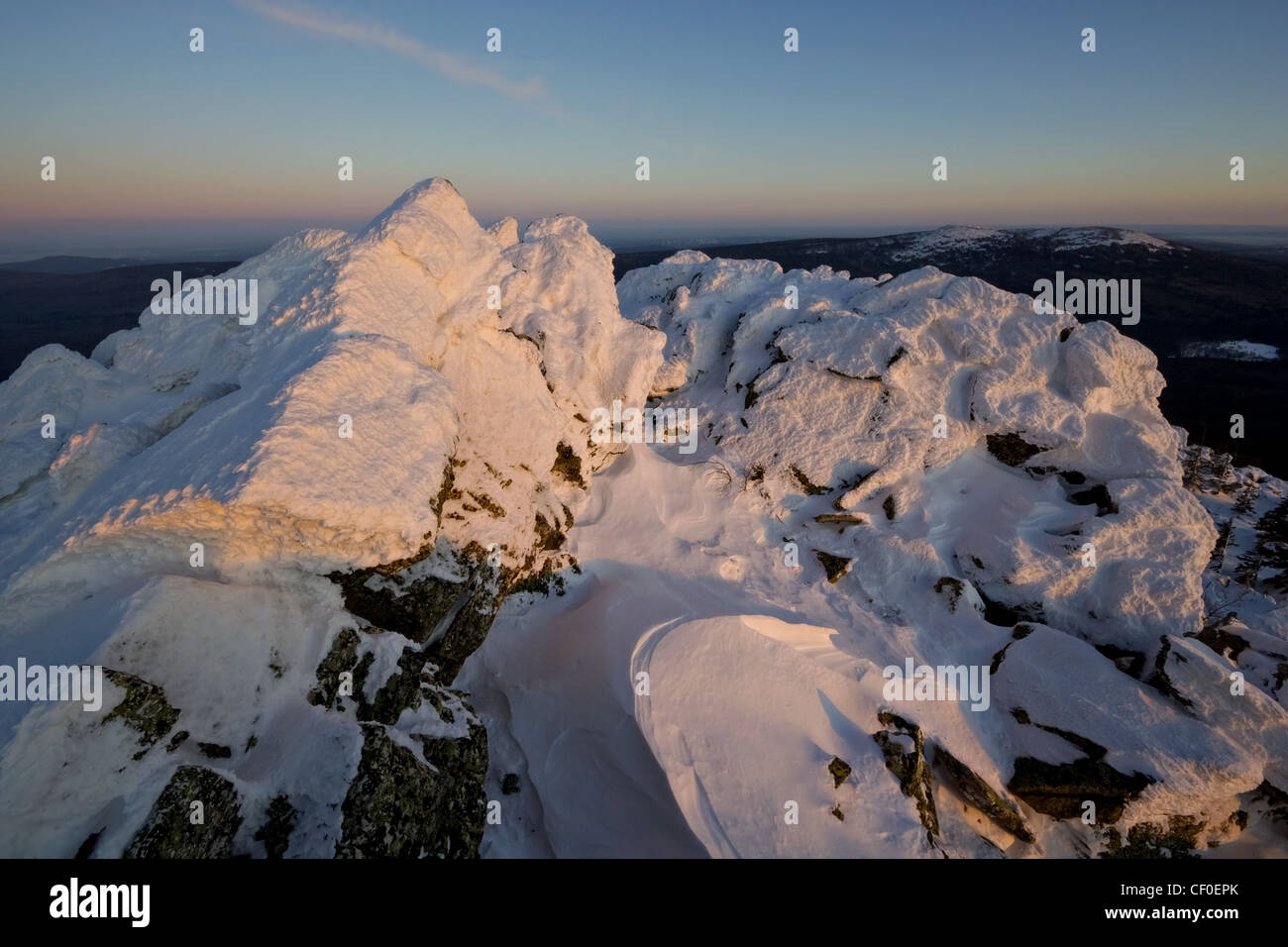 Winter in taiga. Rocks in snow. South Ural mountains. National park ...