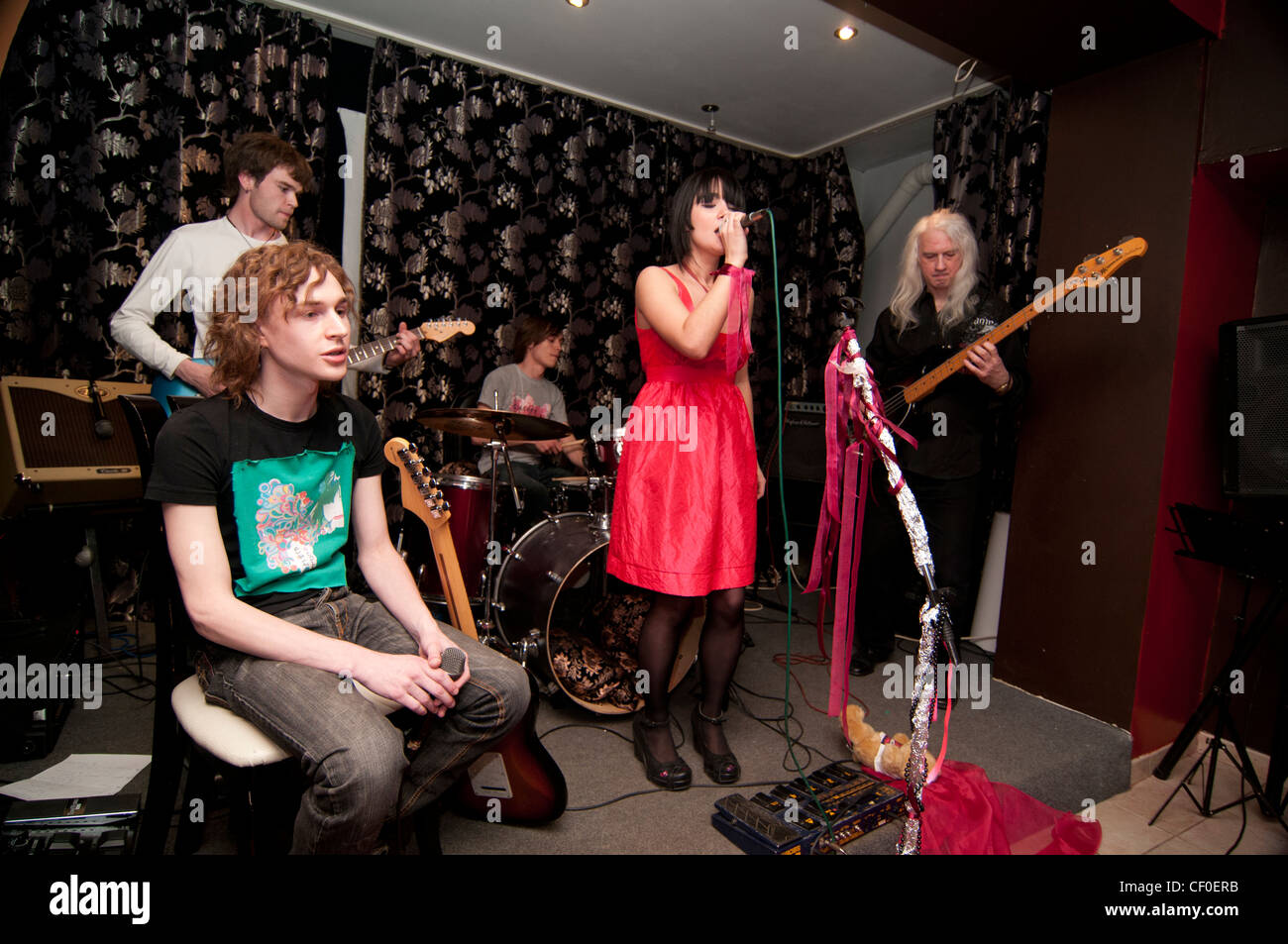 Rock band performing at a small club Stock Photo - Alamy