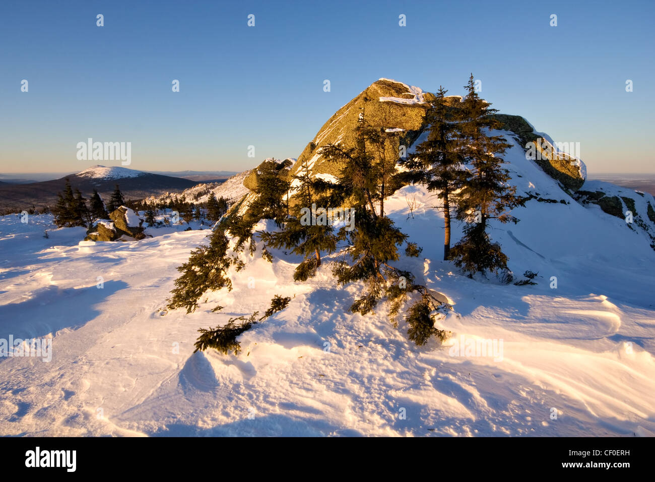 Winter landscape. Sunrise light in National park Taganay. South Ural ...