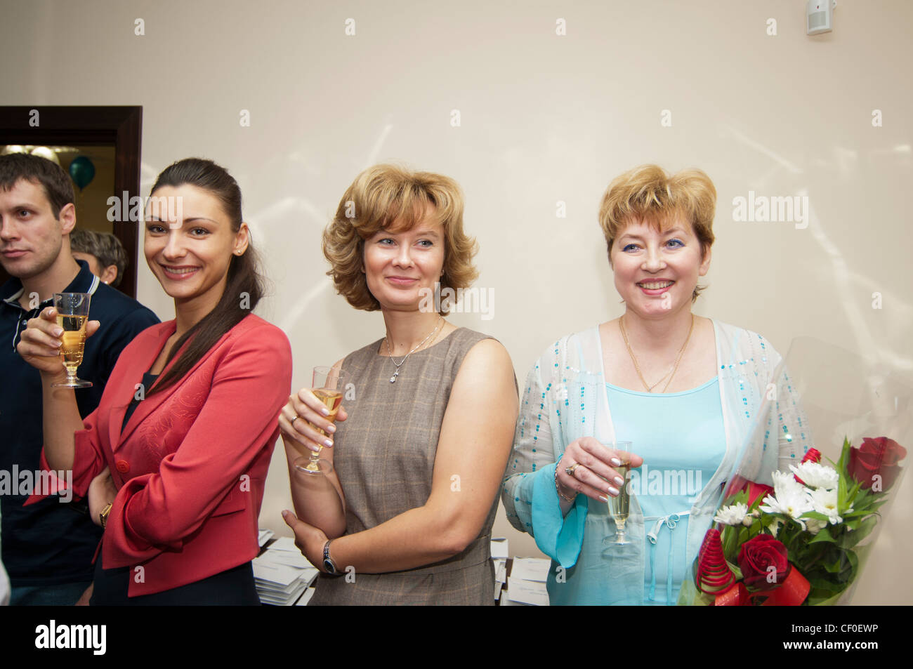 Office workers celebrating corporate event Stock Photo - Alamy