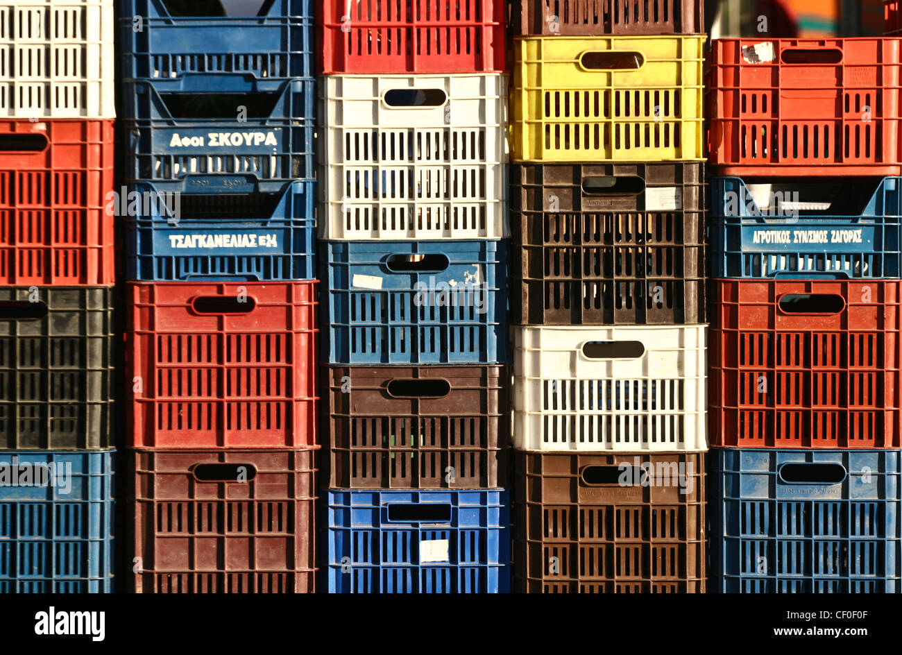 Stack of plastic cases containing bottles Stock Photo - Alamy