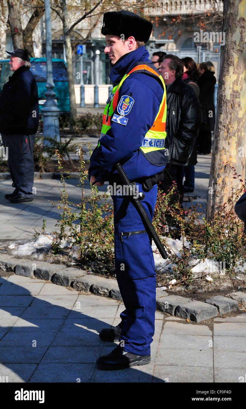 Police watch wreaths laid by Russian officials at memorial to Soviet ...