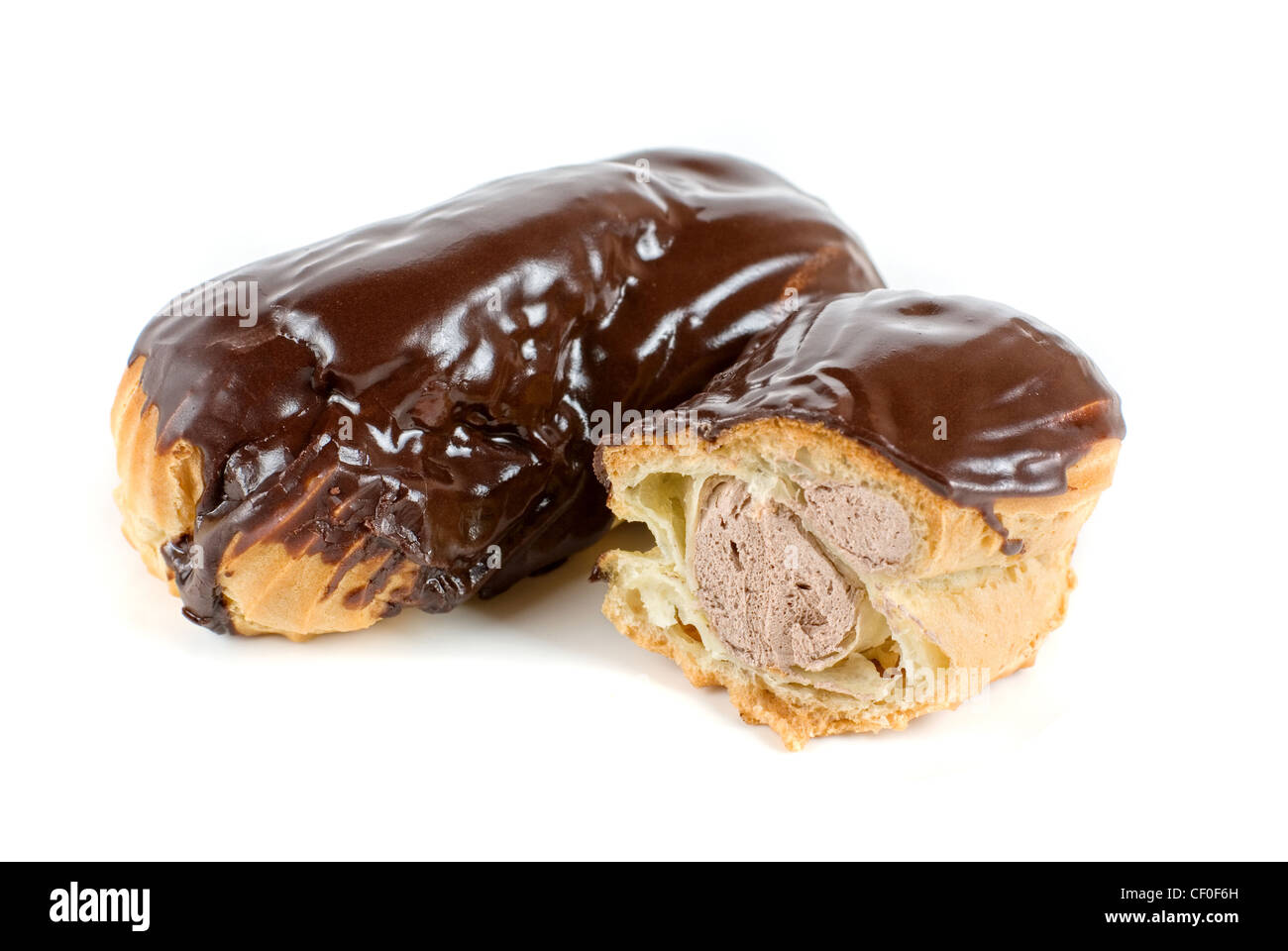Chocolate Cream eclairs isolated on a white background Stock Photo - Alamy