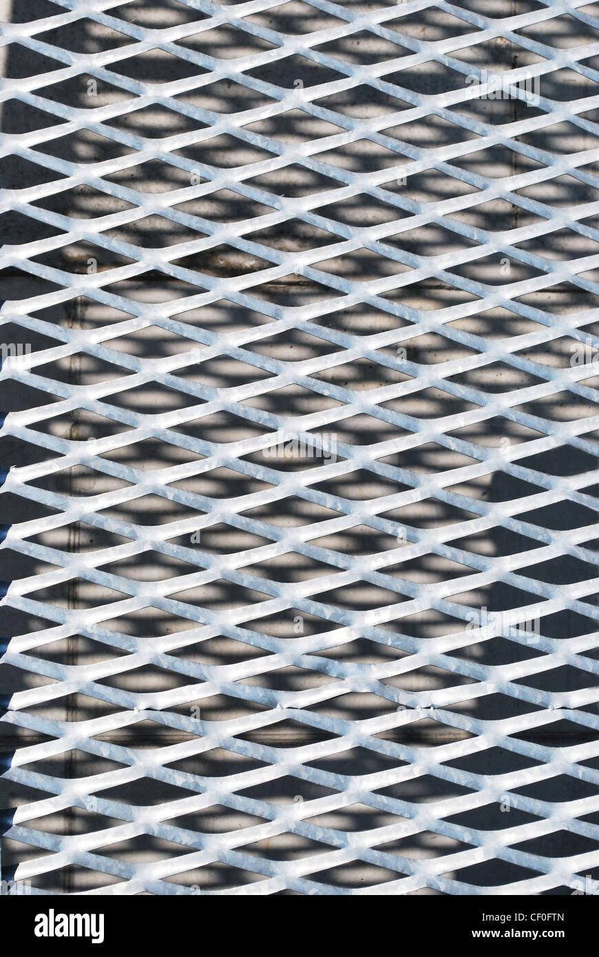 Pattern of metal grid as a background Stock Photo - Alamy