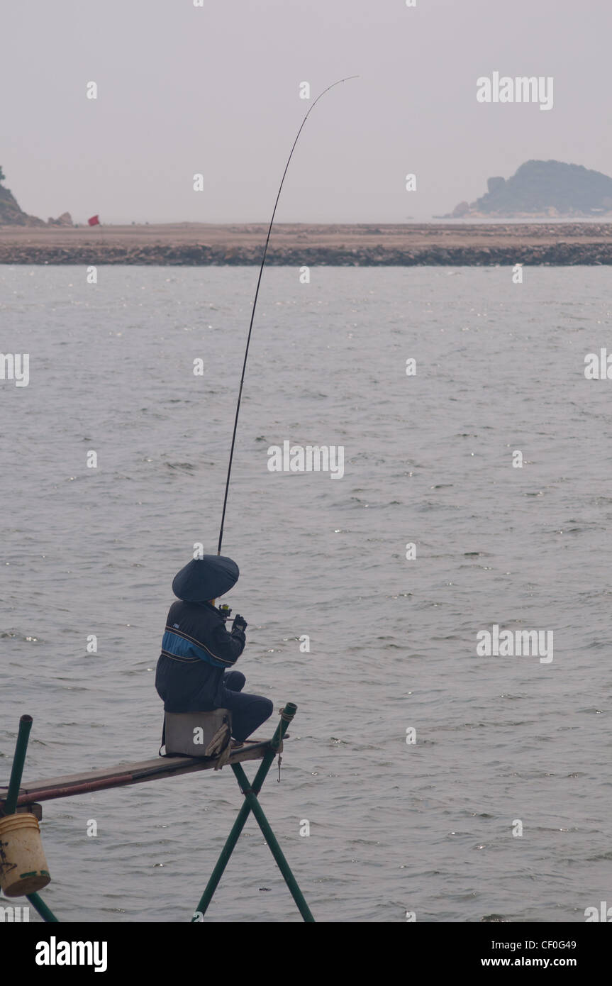 One man sea fishing hi-res stock photography and images - Alamy