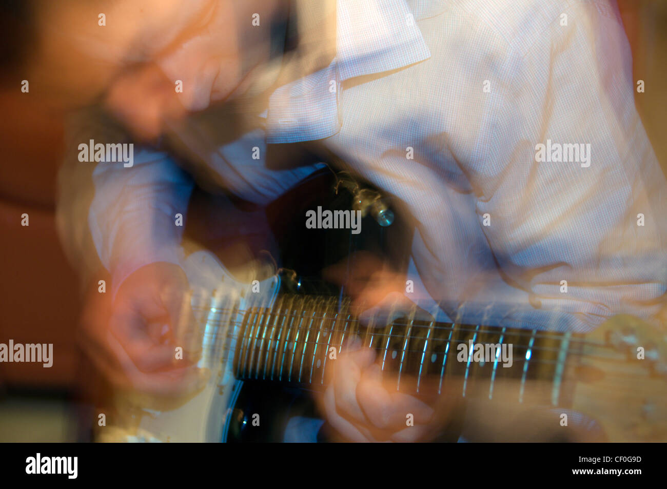 Exploding guitar music Stock Photo - Alamy