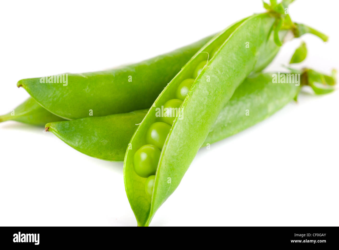 Ripe pea vegetable with green leaf isolated on white background Stock ...