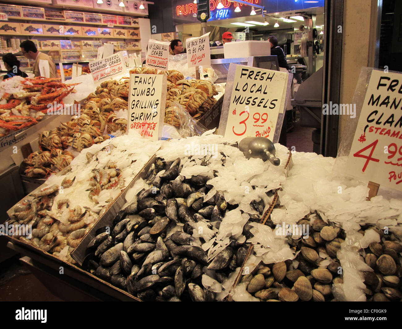 Variety of sea food for sale at a public market in Seattle, shrimp ...
