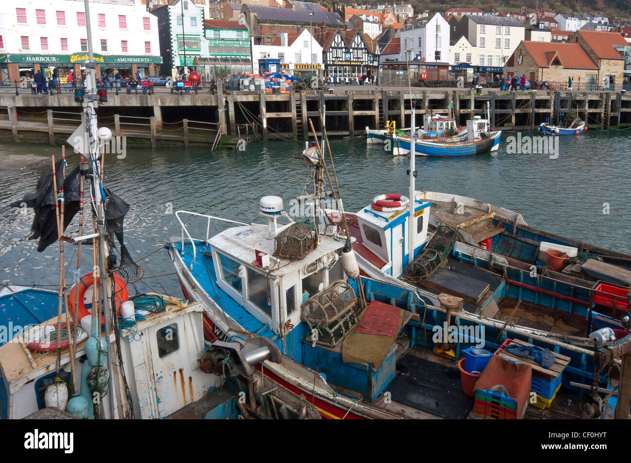 Three fishing vessels from a birds eye view in the fishing harbour of ...