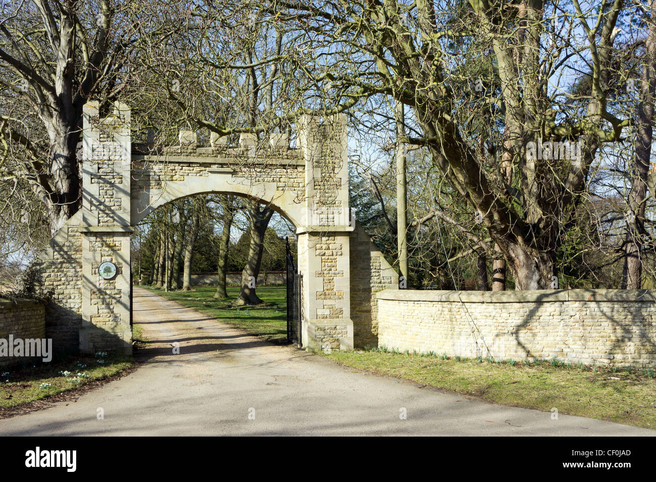 Arched gateway and drive in rural Northamptonshire, England Stock Photo ...