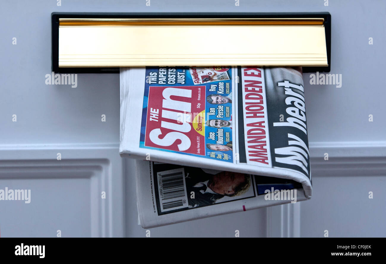 The first edition of the new Sun On Sunday newspaper is seen in the ...