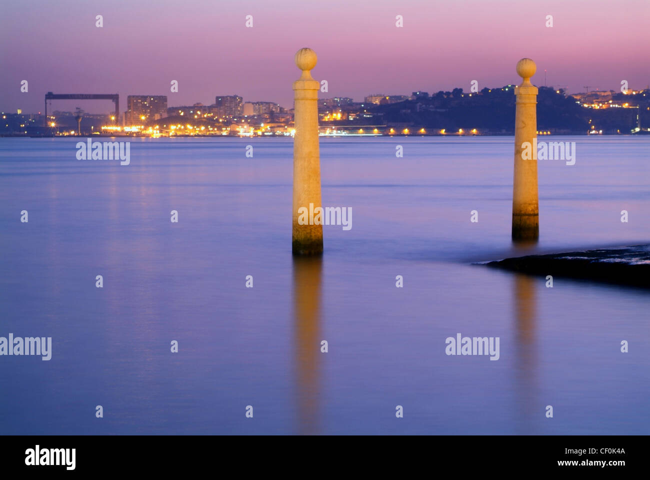 Twin columns on the Tagus River opposite Praca do Comercio, Lisbon ...
