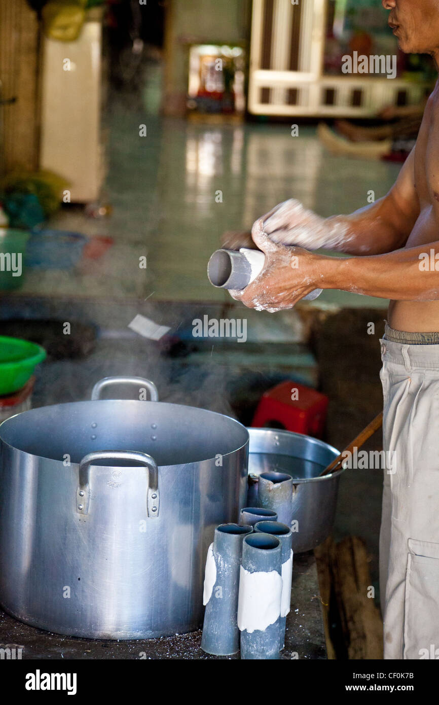 Man making rice noodles hi-res stock photography and images - Alamy