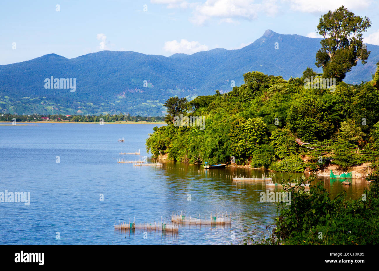 Picturesque view of mountains behind Lak lake, Vietnam Stock Photo - Alamy