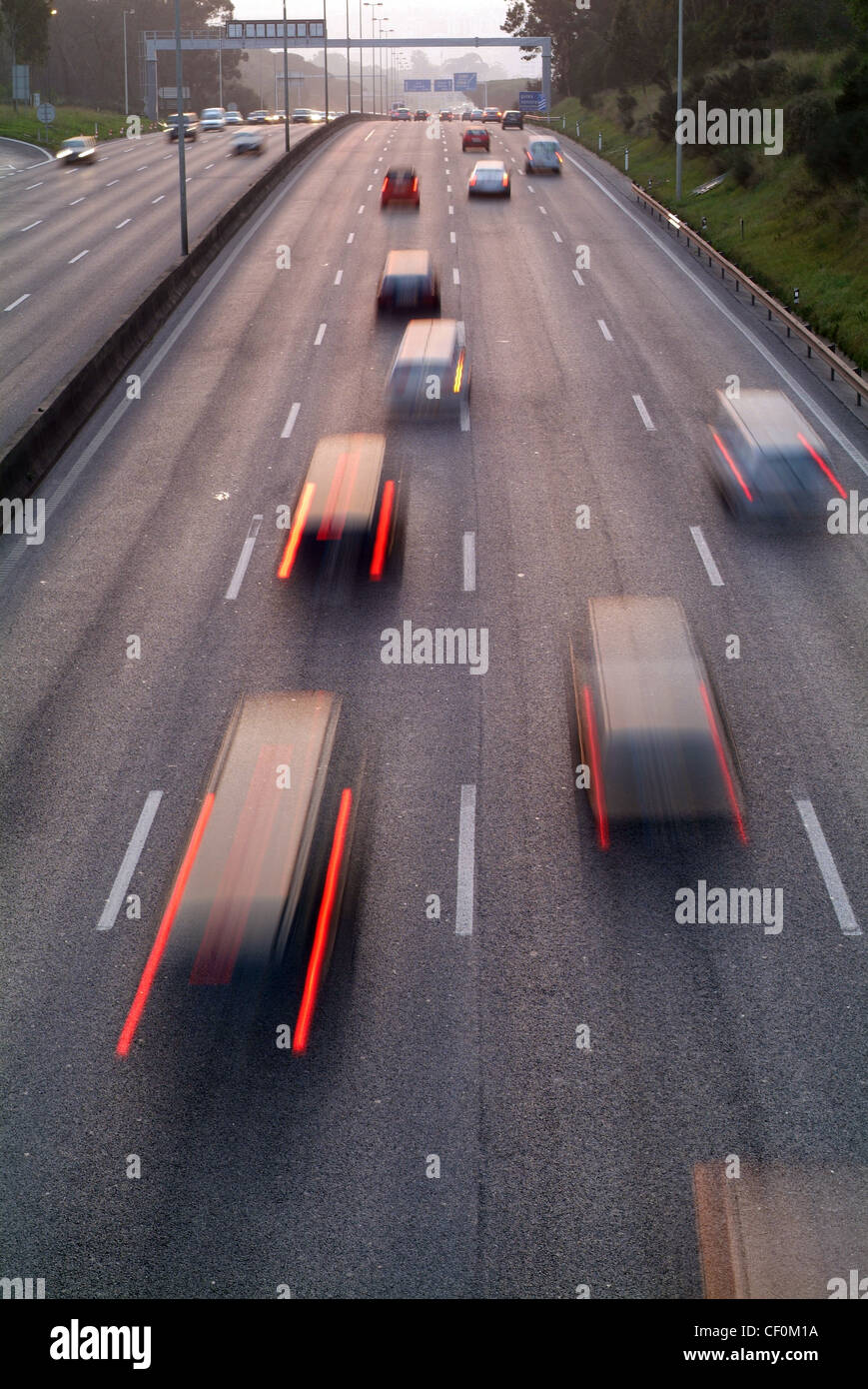 Traffic on a motorway at night Stock Photo - Alamy