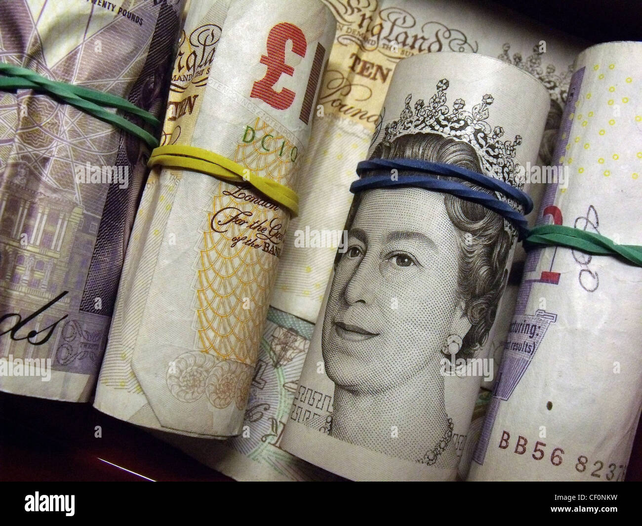 Rolled note £ hi-res stock photography and images - Alamy