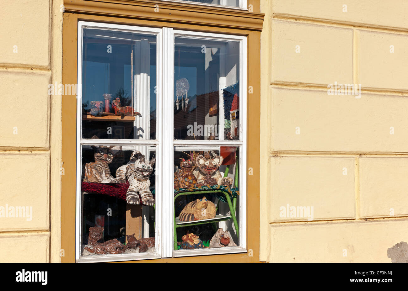 Old house window with toys Stock Photo - Alamy