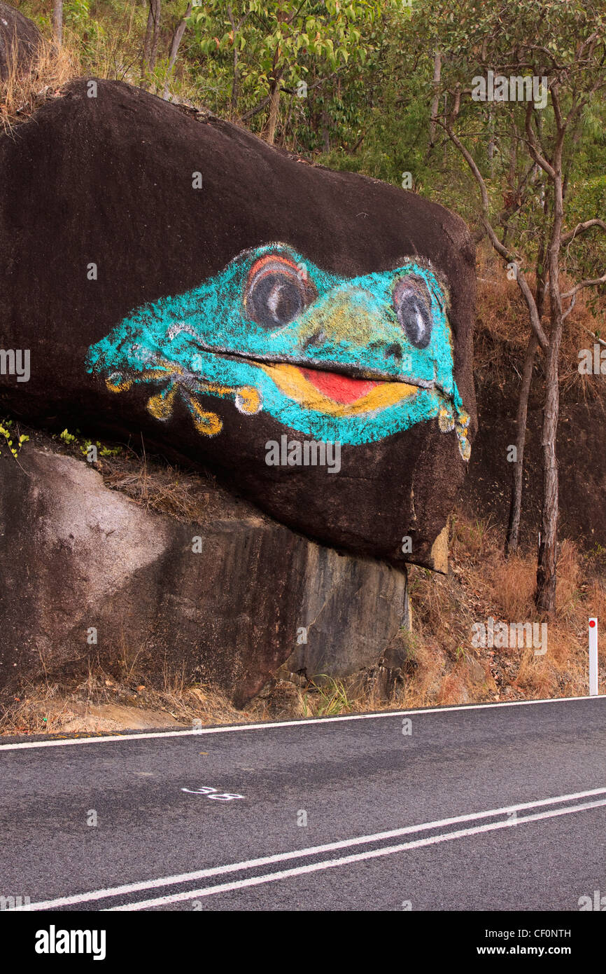 A giant painted green tree frog greets drivers along the Gillies ...