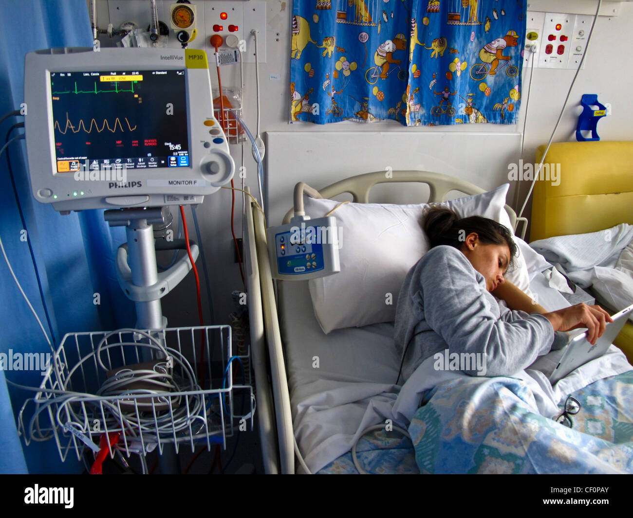 A young girl with anorexia nervosa is treated in hospital by being fed ...