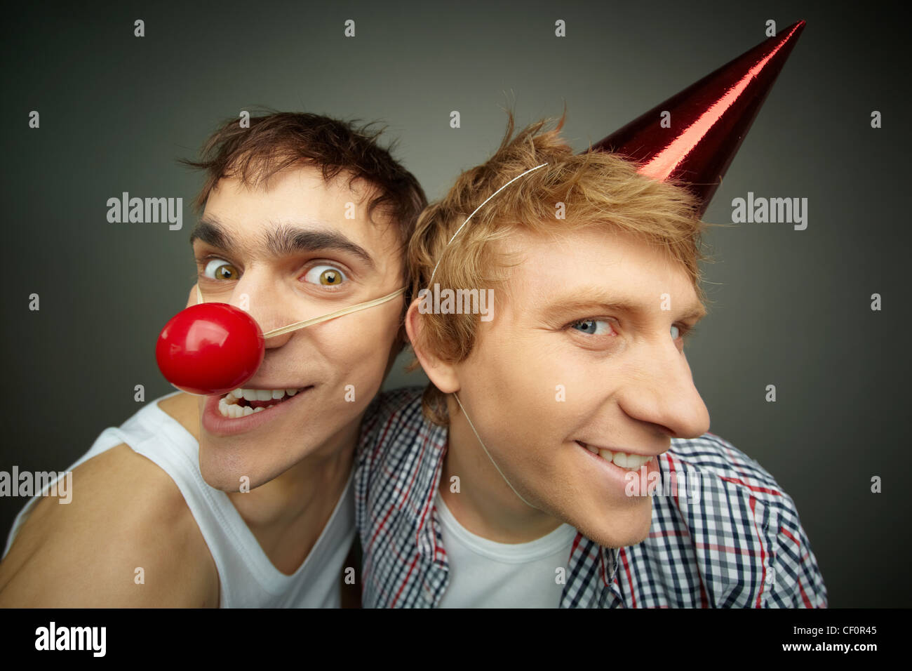 Two funny guys making faces at camera celebrating fool’s day Stock ...