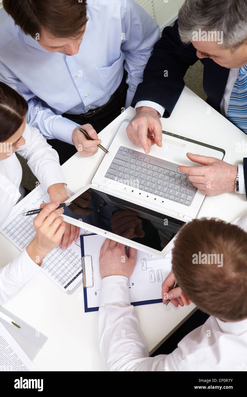 Overview of business people discussing new project Stock Photo - Alamy