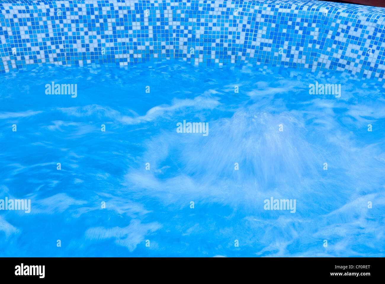 Abstract blue water background of hot whirlpool Stock Photo - Alamy